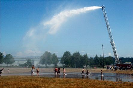 Firefighters help locals stay cool | Arlington Times